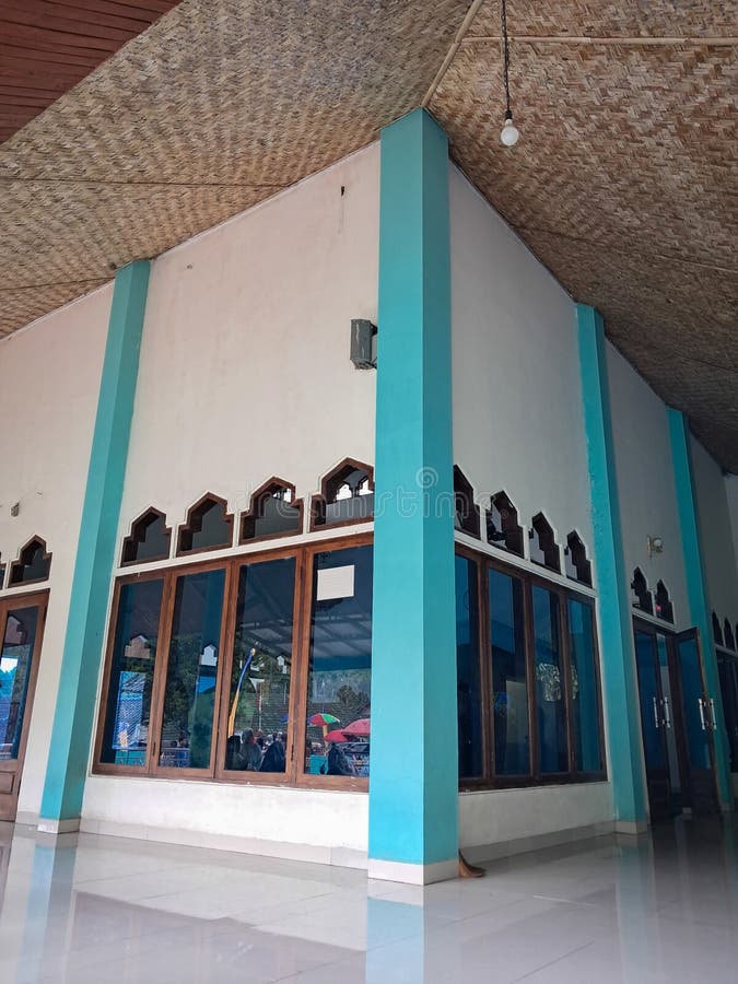 A Serene View of a Modern Mosque Interior with Traditional Elements ...