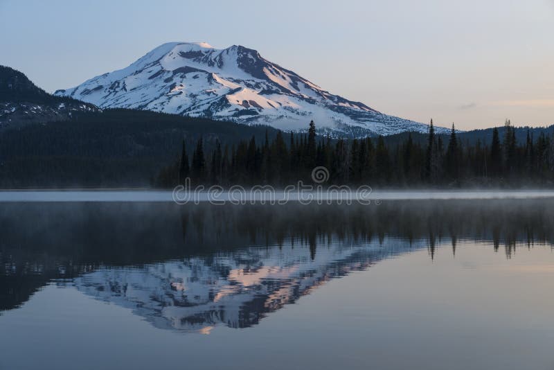 Serene View of Mountain Reflected in Lake Stock Photo - Image of ...