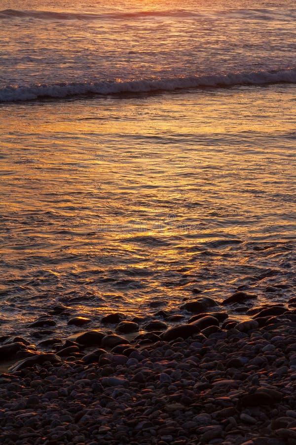 Serene View of the Ocean Bathed in the Soft Pink Light of Sunset. Stock ...