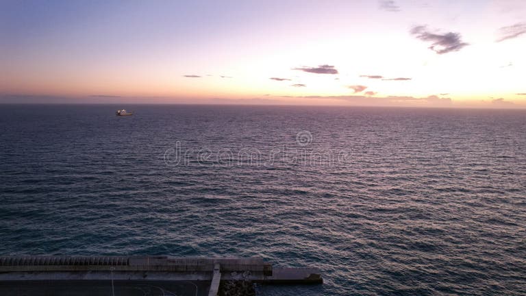 A Serene View of the Open Ocean at Sunset. Stock Image - Image of ...