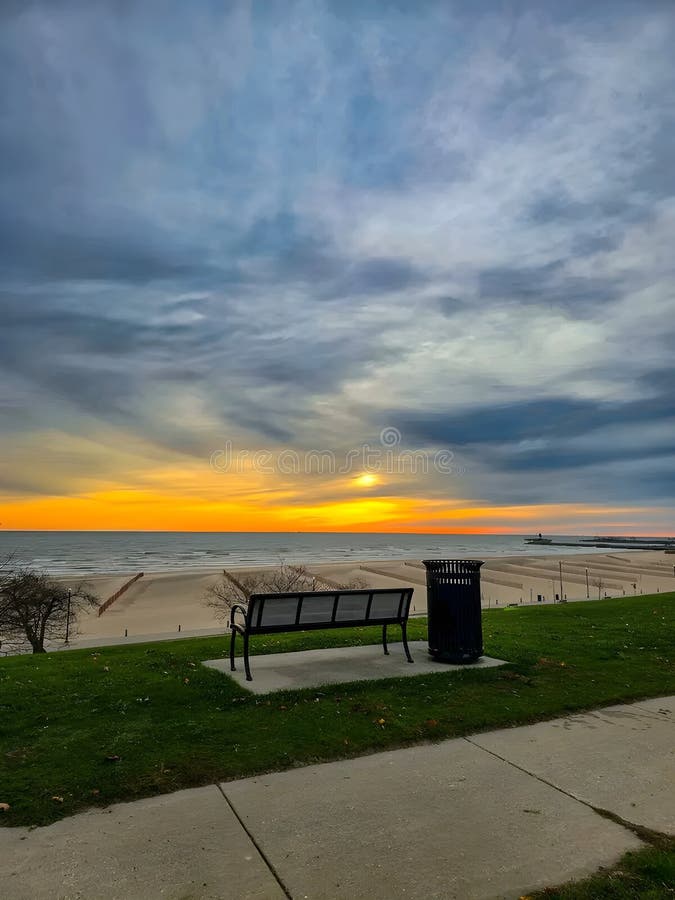 Sunset on the Beach with a Bench Stock Photo - Image of morning, nature ...