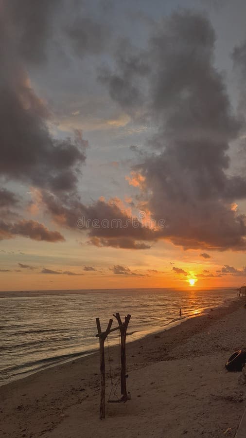 A Serenity when Looking at the Sunset on the Beach in the Afternoon is ...