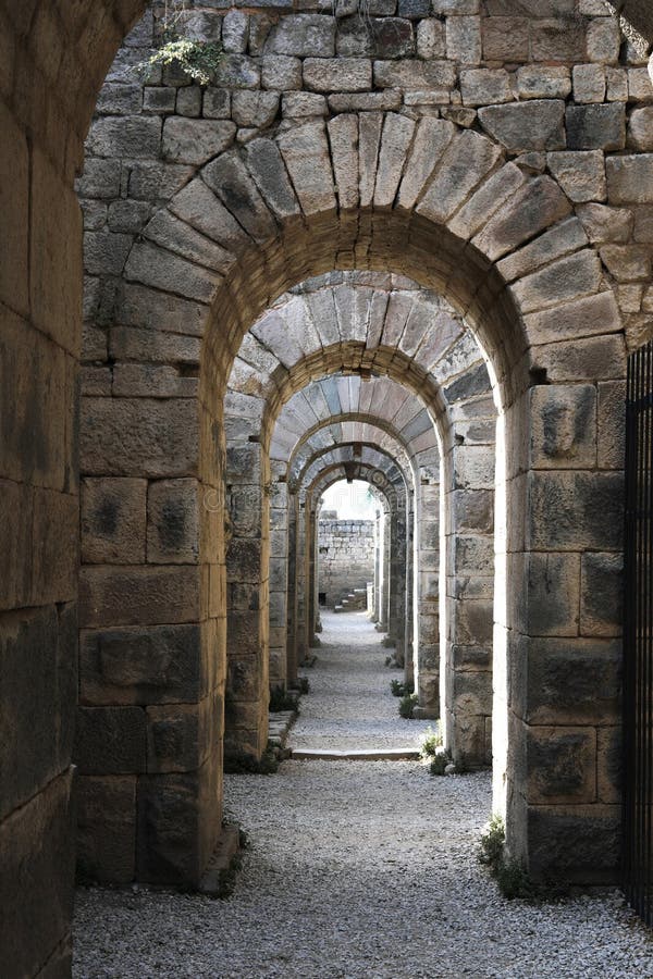 Series of Ancient Stone Arches in a Corridor Stock Photo - Image of ...