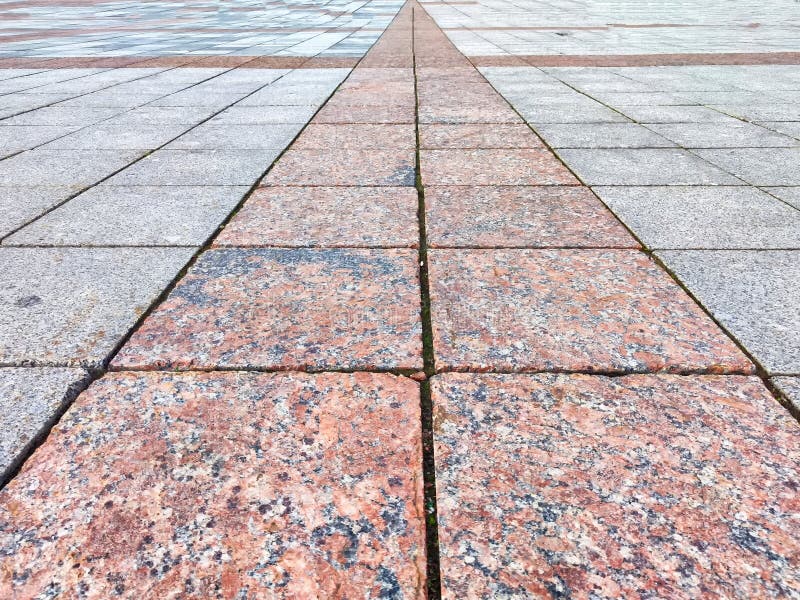A Series of Granite Paving Stones Forms a Distinct Pathway through a ...
