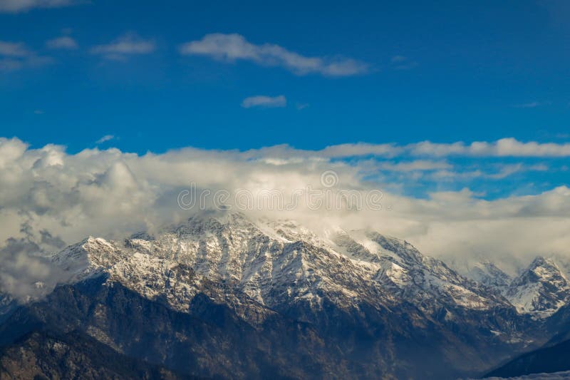A Series of Himalayan Mountain in Garhwal Range Against Clouds and Sky ...