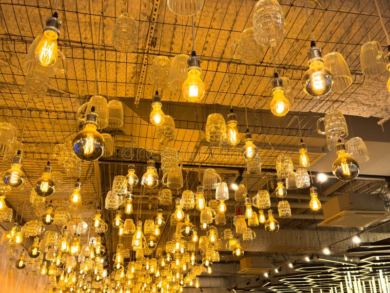 A Series of Lights Hanging from the Ceiling, Some of Which are Lit Up ...