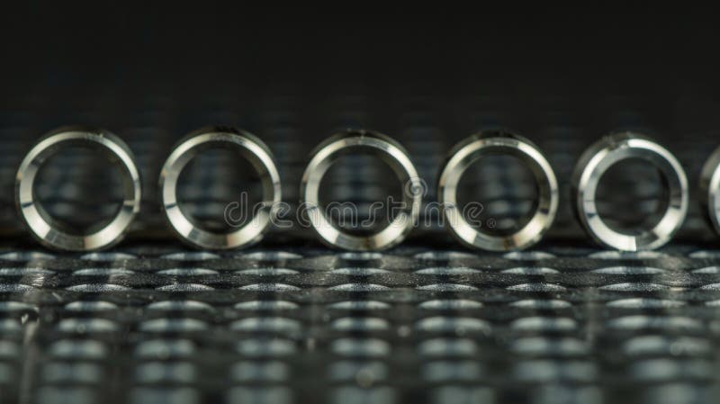 A Series of Photographs Show a Small Metal Ring Undergoing Repeated ...