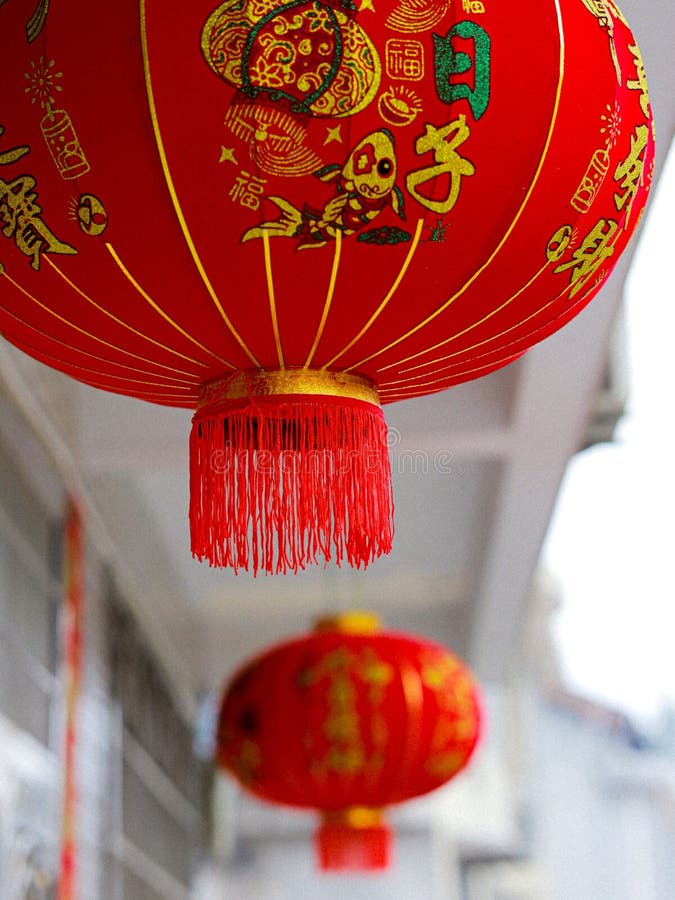 Series of Red Chinese Lanterns Hang from a Balcony Stock Image - Image ...