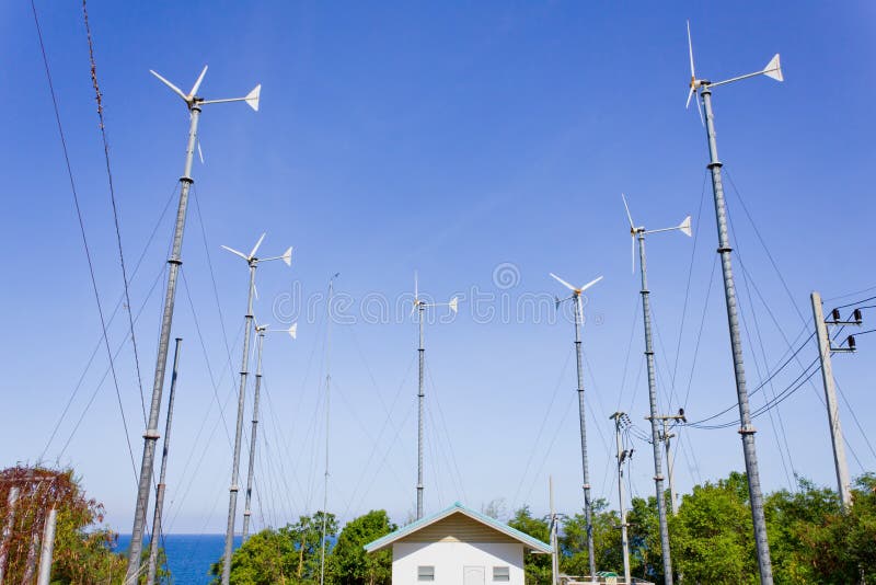 Series of Wind Power Generators in Clear Blue Sky Background. Stock ...