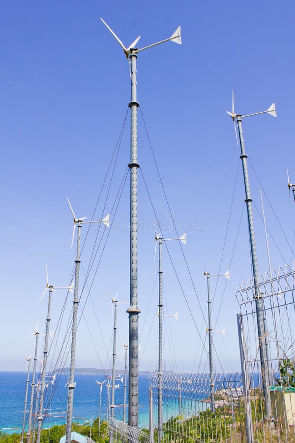 Series of Wind Power Generators in Clear Blue Sky Background. Stock ...