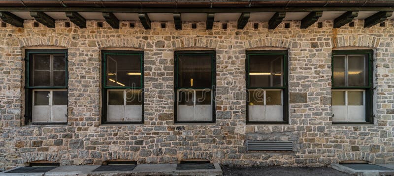 Series of Windows Lined Up on a Building of Clear Stones Stock Photo ...