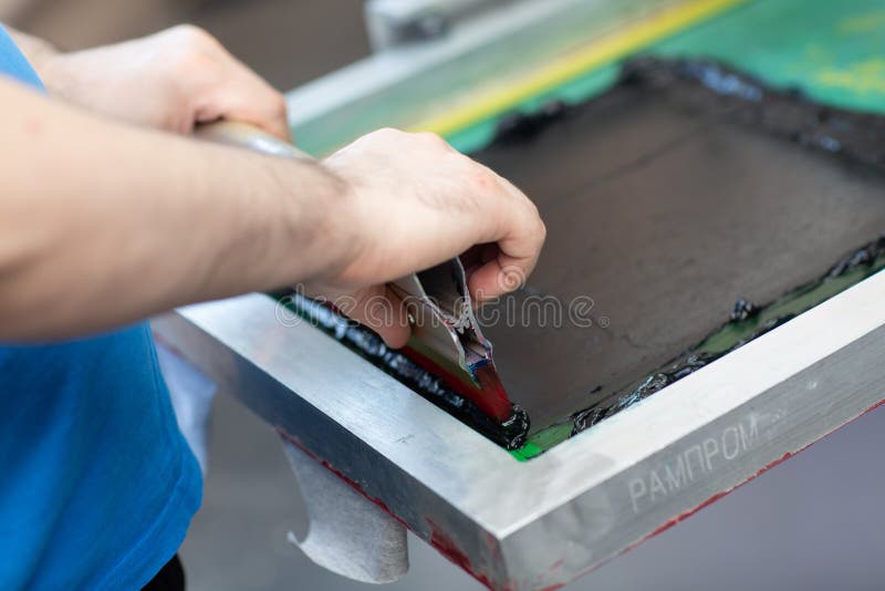 Serigraphy Silk Screen Print Process at Clothes Factory. Frame ...