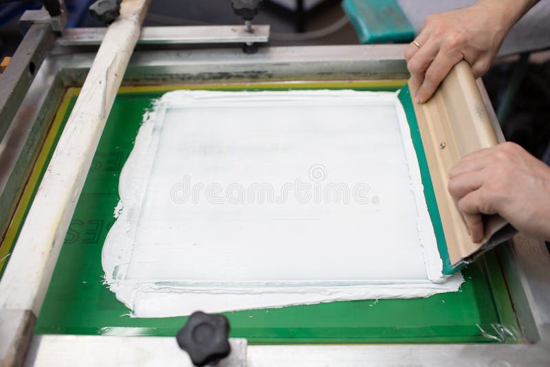 Serigraphy Silk Screen Print Process at Clothes Factory. Frame ...