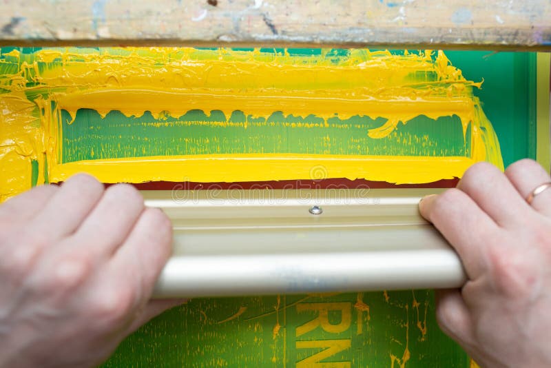 Serigraphy Silk Screen Print Process at Clothes Factory. Frame ...