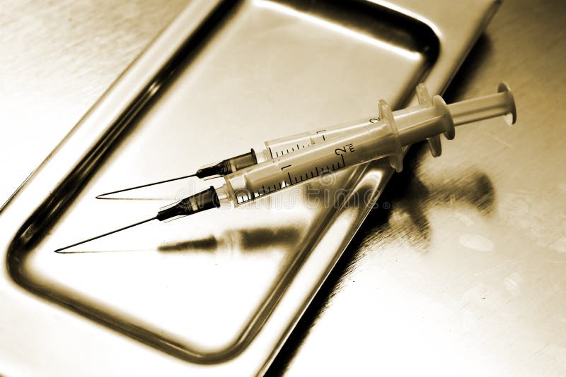 Seringues photo stock. Image du instruction, seringue - 2301162