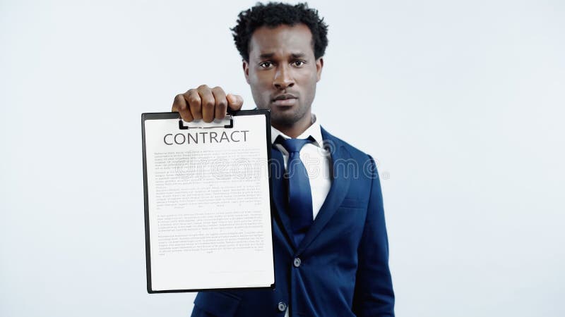 Serious African American Businessman Holding Clipboard Stock Photo ... Serious African American Businessman Holding Clipboard Stock Photo ...
