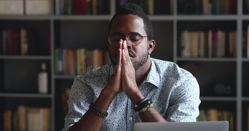 Serious African Man Praying Asking for Help or Concentrating Stock ...