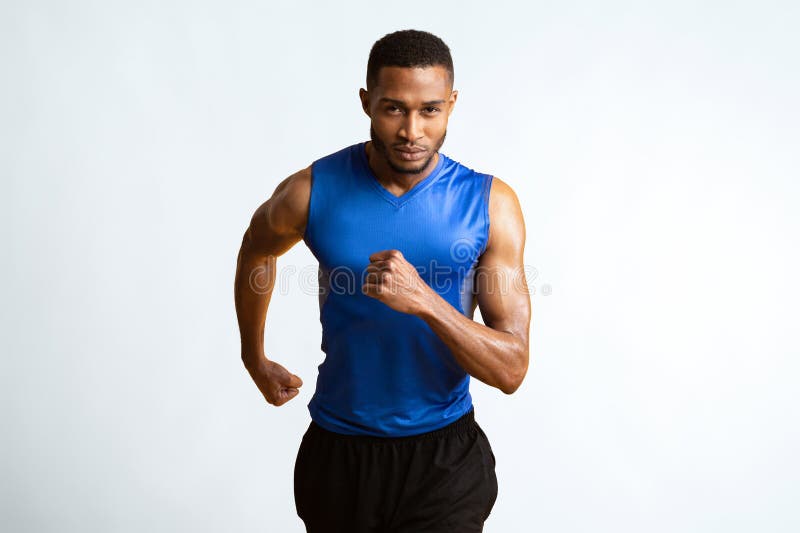 Serious Afro Guy Running at Camera at Studio Stock Image - Image of ...