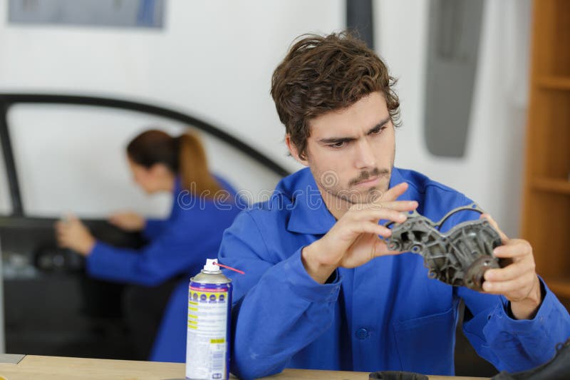 Serious Apprentice Mechanic at Work Stock Image - Image of worker ...