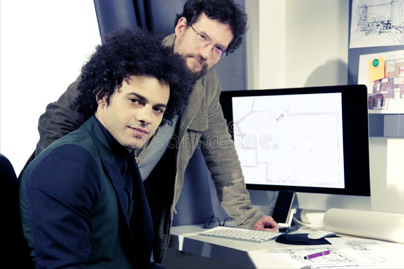 Serious Architect Working with Computer in Office Looking Camera Stock ...