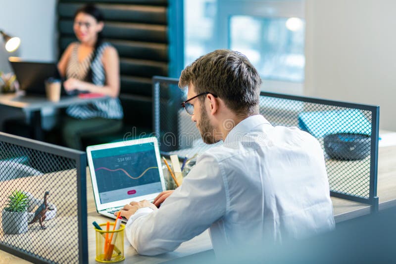 Concentrated Young Man Staring at His Computer Stock Photo - Image of ...