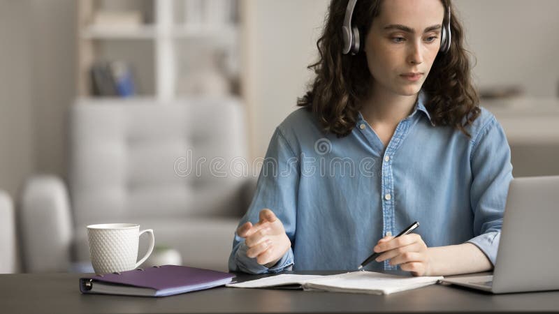 Serious Attractive Student Girl E-learning, Listening Audio Course ...