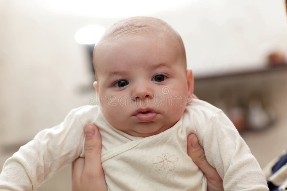 Serious baby boy stock photo. Image of affection, baby - 23444106