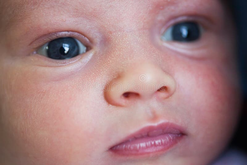 Serious baby face closeup stock photo. Image of small - 32308148
