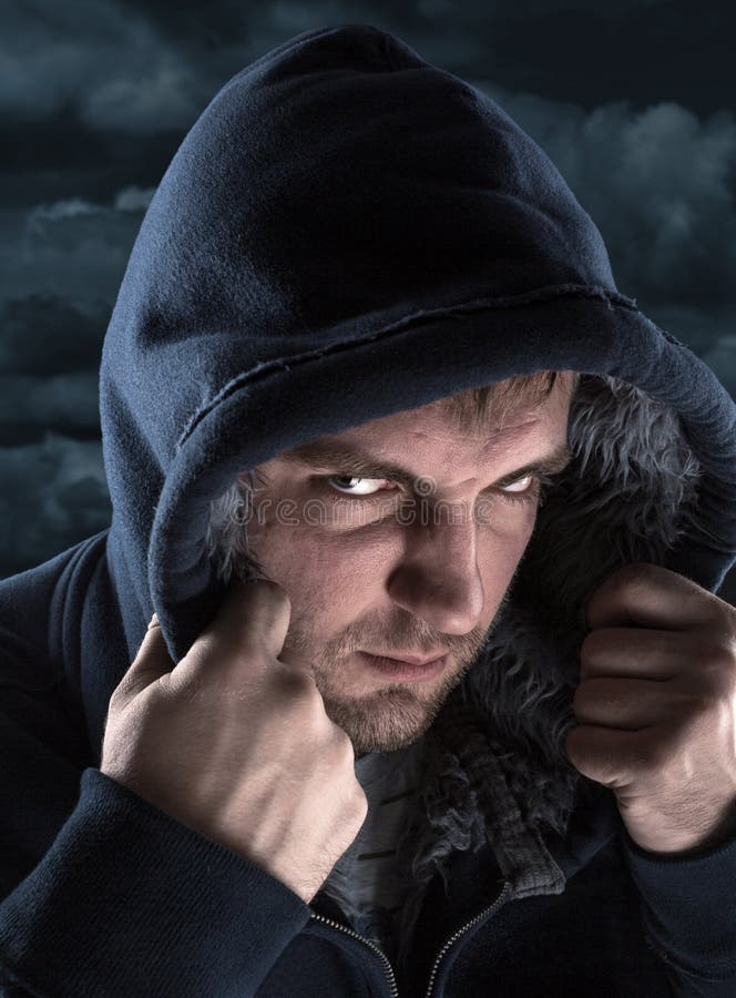 Hooded Man Taking Off His Face Mask Stock Photo - Image of alteration ...