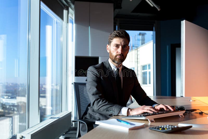 Serious Bearded Businessman Boss Working at Computer in Modern Office ...