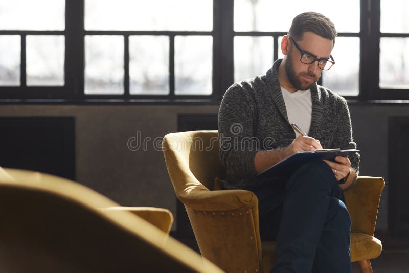 Man writing in document stock image. Image of males - 182799755
