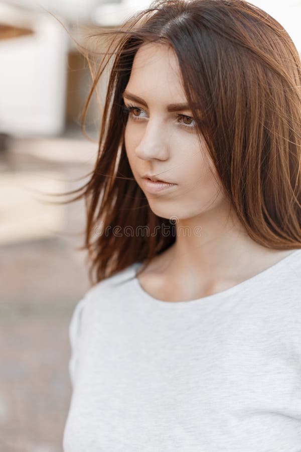 Modest Beautiful Girl Looks Down. Portrait of a Pretty Woman Stock ...