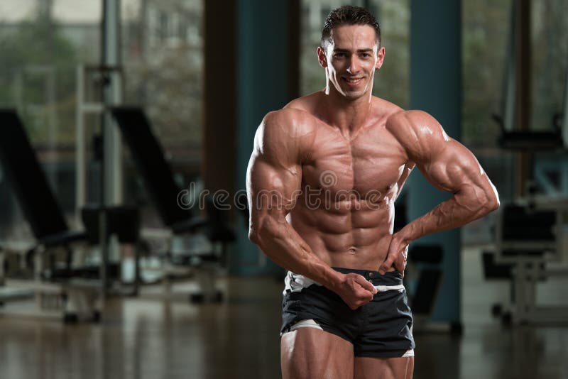 Serious BodyBuilder Standing in the Gym Stock Image - Image of exercise ...