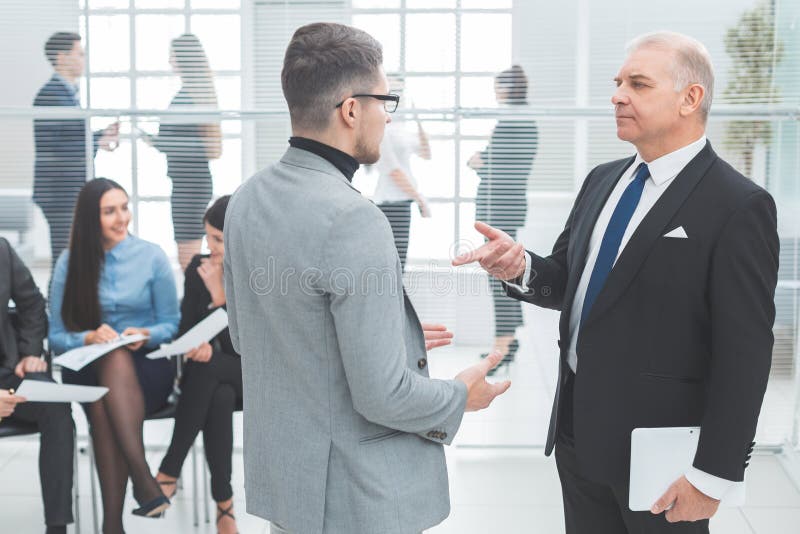 Boss Explaining Graphics To Partners during Cooperation Stock Image ...