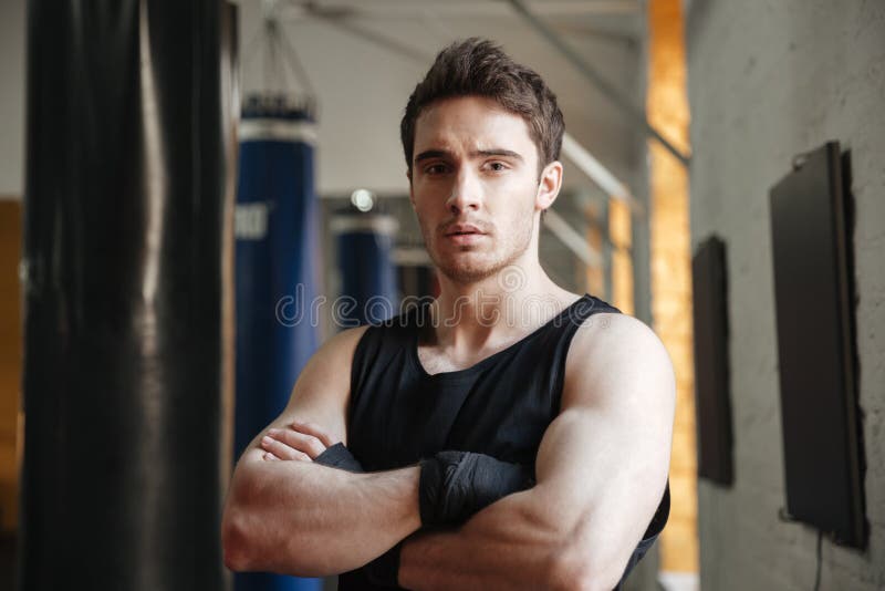 Serious Boxer Standing with Crossed Arms Stock Image - Image of ...