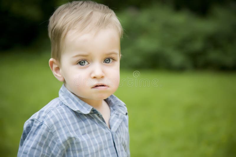 Serious Boy stock image. Image of lifestyle, blonde, baby - 5517757