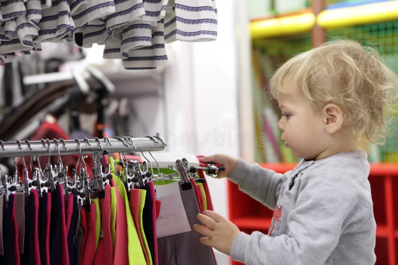 Serious Toddler Choosing Clothes Stock Photos - Free & Royalty-Free ...
