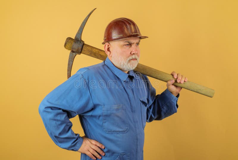 Serious Bricklayer in Hard Hat with Pickaxe. Bearded Construction ...