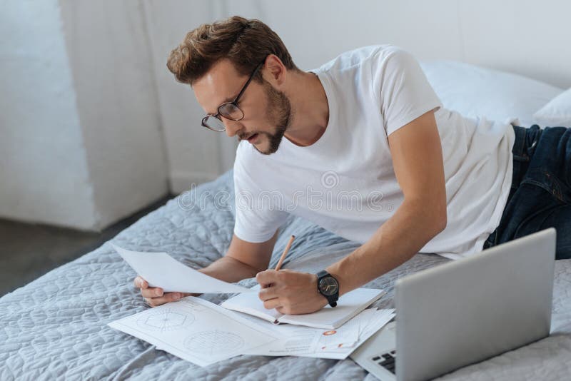 Serious Brunette Doing Sketch of His Project Stock Photo - Image of ...