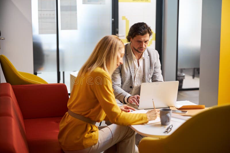 Concentrated Female Person Making Notes after Conversation Stock Image ...