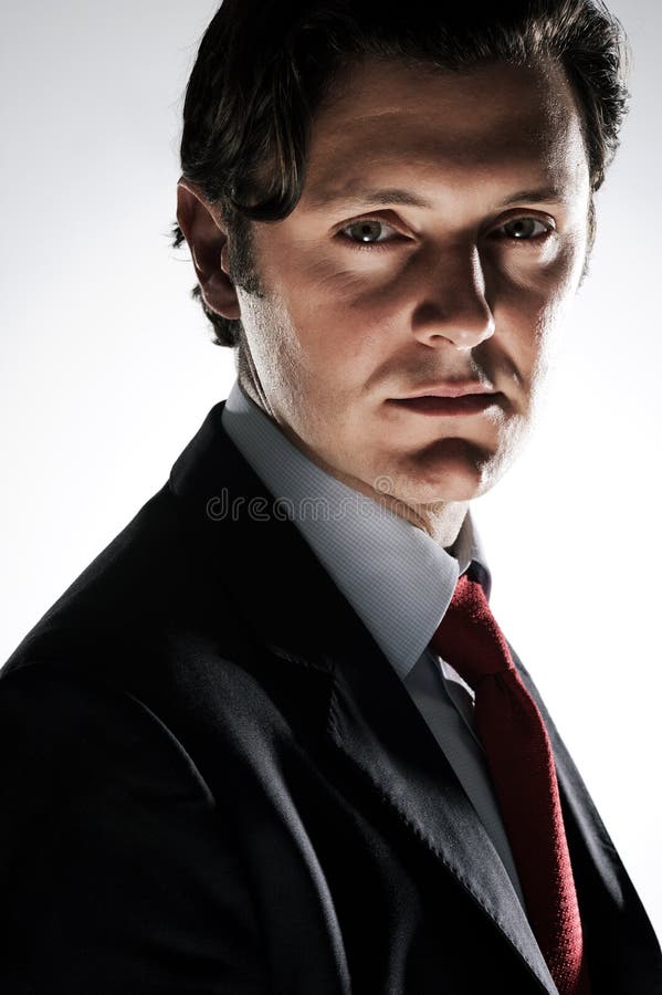Devious businessman stock photo. Image of shaven, dramatic - 22749652