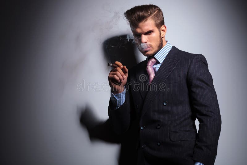 Serious Business Man is Smoking His Cigar Stock Photo - Image of ...