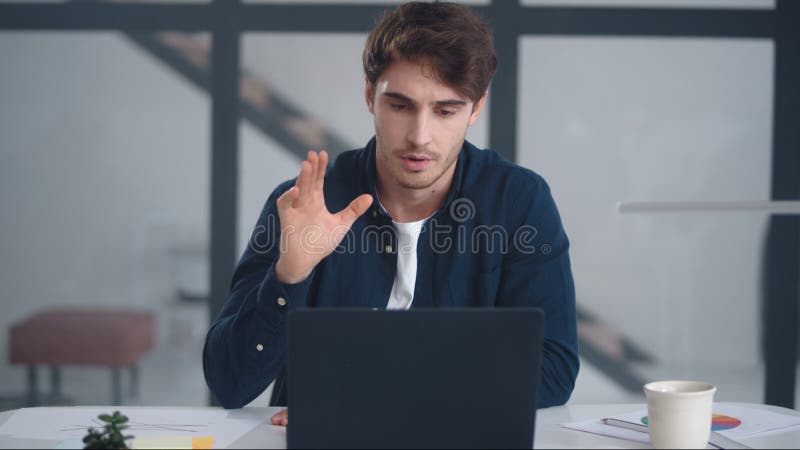 Serious Business Man Talking on Video Conference. Focused Man ...