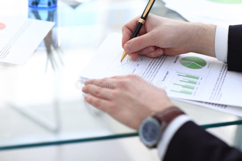 Serious Business Man Working on Documents Looking Concentrated with ...