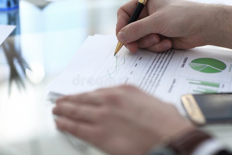 Serious Business Man Working on Documents Looking Concentrated with ...