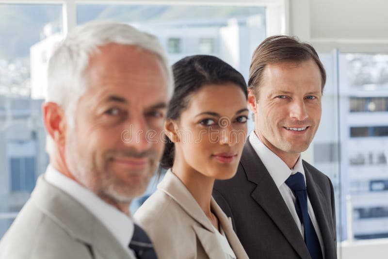 Serious Colleagues Looking Same Way Stock Photos - Free & Royalty-Free ...
