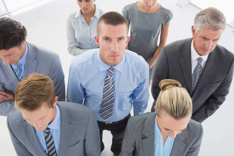 Serious Business People Looking at Camera during a Meeting Stock Photo ...