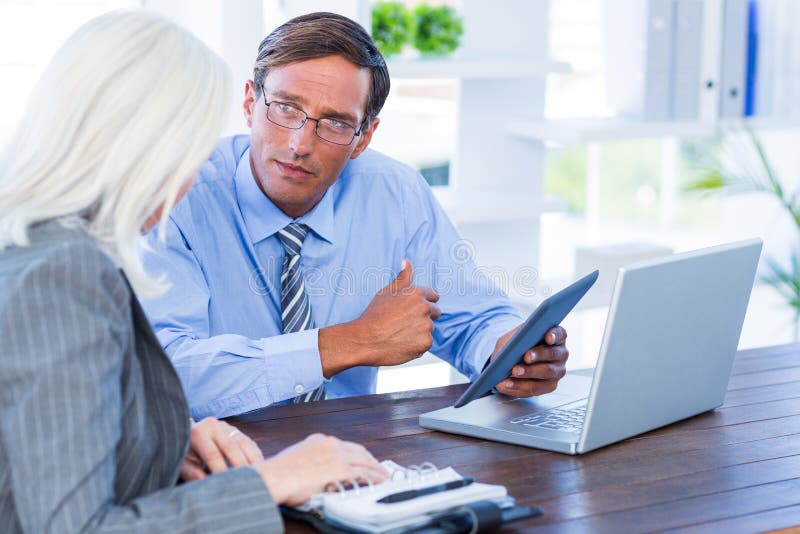 Serious Business People at a Presentation Stock Image - Image of ...