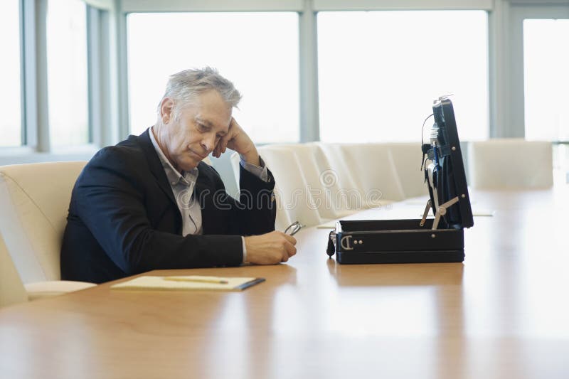 Serious Businessman with Open Briefcase Stock Photo - Image of ...