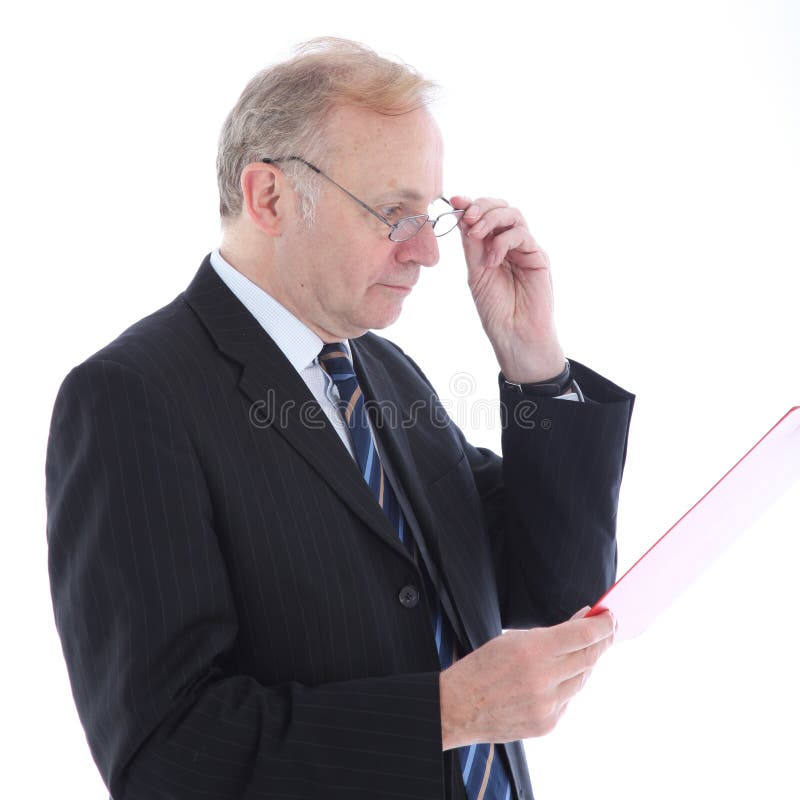 Serious Businessman Reading Report Stock Image - Image of notes, male ...